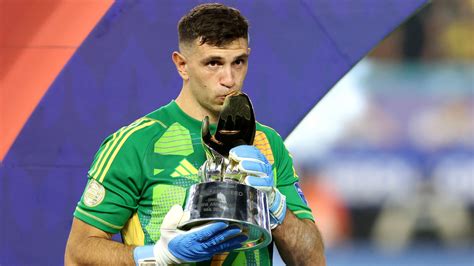 Emi Martinez Swaps Lewd For Love In Golden Glove Celebration With