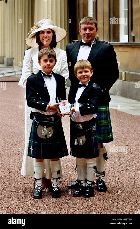 Dr Michael Cambell Mccafferty Stands With His Wife Anna As His Sons