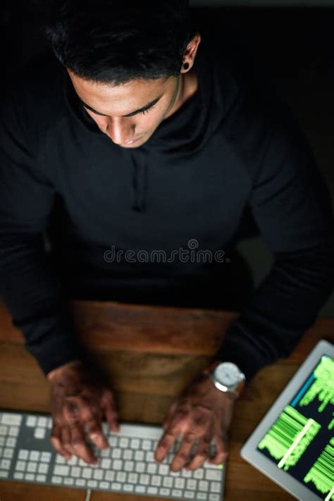 For Programming Hes Your Guy High Angle Shot Of A Young Hacker