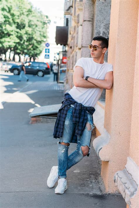Attractive Guy Standing On The Street In Sunglasses Self Confidence