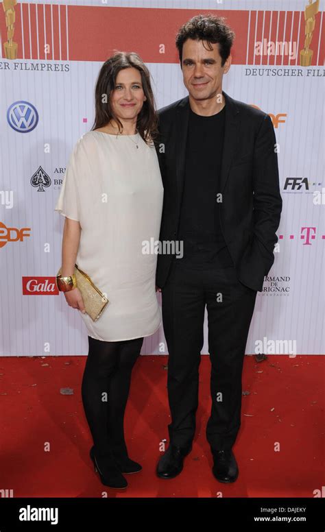German Film Director Tom Tykwer R And Marie Steinmann Arrive For The Award Ceremony Of The