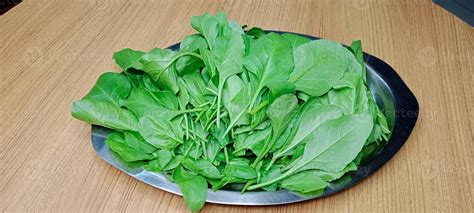 Bunch Of Fresh Spinach Indian Palak Leaf Piled Up On The Market Ready