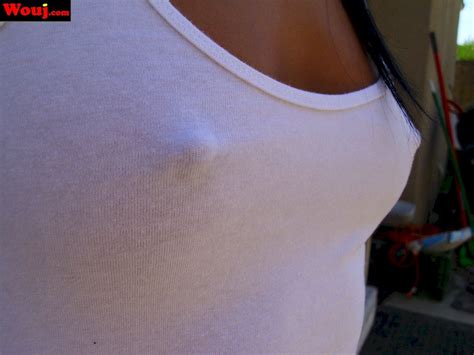 Solo Brunette Chick Showing Her Hard Nipples Under Her White Shirt 15