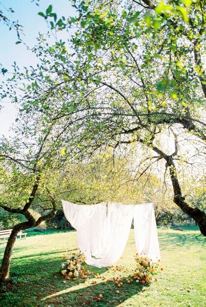 Premium Photo White Curtains Hang In The Garden Over Bouquets Of