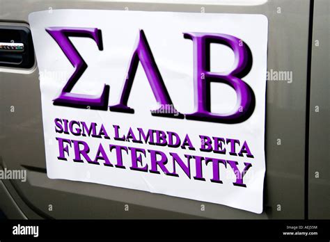 Latino Sigma Lambda Beta Fraternity Sign On Side Of Hummer Suv Float