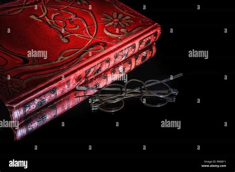 Closeup Very Old Spectacles Eyes Glasseson Very Old Red Book Lying On