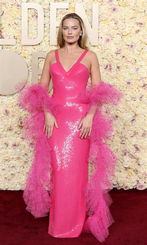 Margot Robbie Attends The 81st Annual Golden Globe Awards In Beverly Hills 01 07 2024 Lacelebs Co