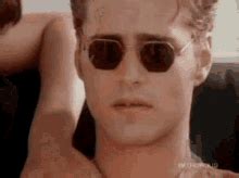 Pulls Down Glasses S Tenor