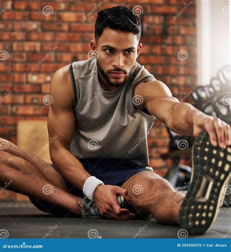 Supple Muscles From Head To Toe A Young Man Stretching Before His