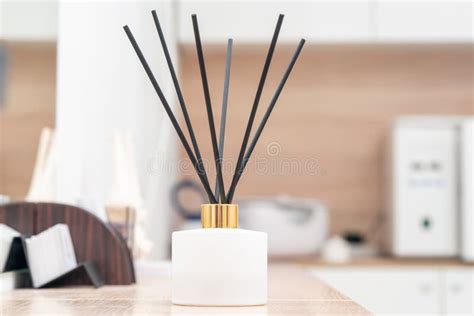 Aroma Diffuser For Perfumed Liquid And Reed Sticks In The Room On A