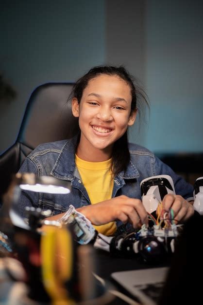 Premium Photo The Girl Playing With The Electronics That Power The