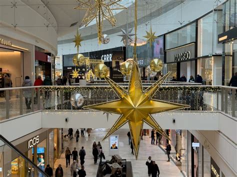 Modern Multi Level Shopping Mall Interior With A Large Atrium And Stock