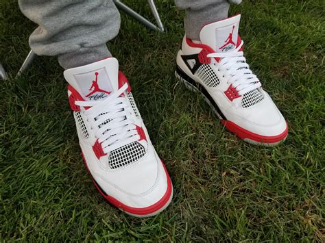 Jordan Retro 4 Fire Red On Feet Air Jordan 4 Red Cement On Foot