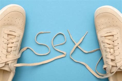 Premium Photo Women Sneakers With Laces In Sex Text