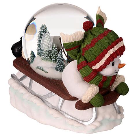 Snow Globe With Snowman On Sled Lights And Music And Snow Movement