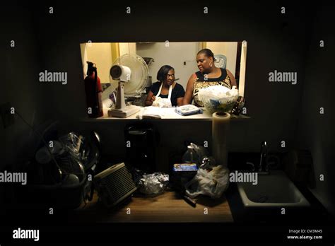 July 23 2012 Sapelo Island Ga Usa Lula Walker Left Cleans Up After Serving Dinner For