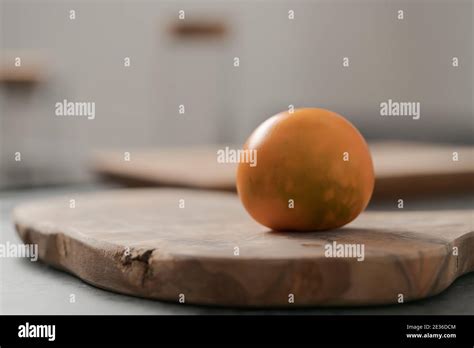 Lulo Fruit On Olive Wood Board On Kitchen Countertop Shallow Focus