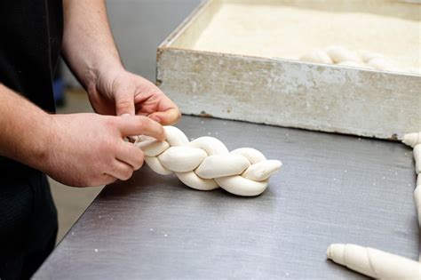 Premium Photo Making Braided Bread In A Bakery Traditional Shabbat