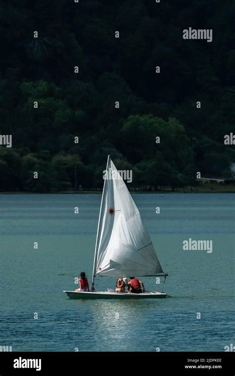 Small Sail Boat In The Furnas Lake Lagoa Das Furnas With Green