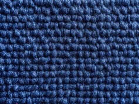 Indigo Closeup Of Monochrome Carpet Texture Background From Above