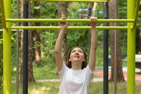 Teenager Sport At School And College Teen Girl Doing Sports Exercises