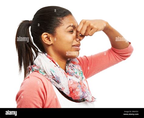 What A Stench A Young Woman Holding Her Noise To Block A Horrid