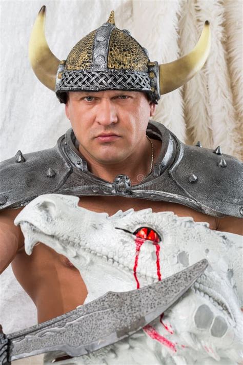 A Muscular Man In Costume Viking With A Sword And Stock Image Image Of Muscled Muscular