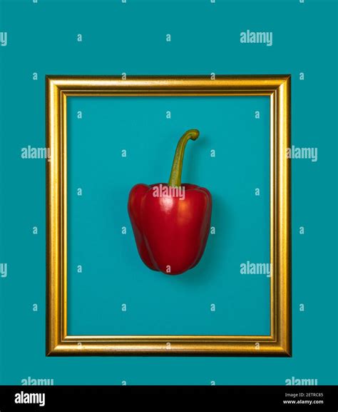 Red Peper In Golden Frame Flat Lay Minimal Concept With Blue