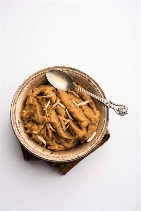 Premium Photo Wheat Laapsi Lapsi Shira Halwa Is An Indian Sweet Dish Made Of Broken Wheat