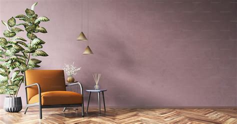 커피 테이블 식물 주황색 안락의자가 있는 거실 내부는 복사 공간 3d 렌더링이 있는 빨간색 모형 벽 위에 있습니다 사진 Unsplash의 실내 이미지