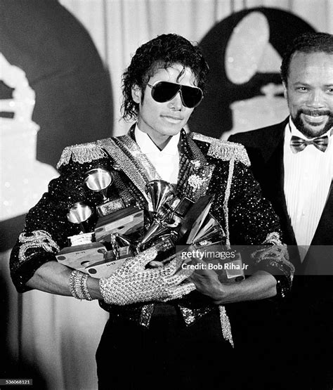 Michael Jackson With Armload Of Grammy Awards He Won At The 26th