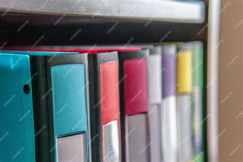 Premium Photo Collection Of Color Coded Binders To Keep Documents