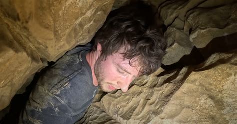 Youtuber Goes Down A Very Deep Sinkhole And Momentarily Gets Stuck