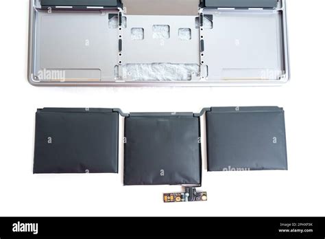 Expanded Laptop Battery Is Placed Next To A Laptop That Has Been Taken Apart Importance Of