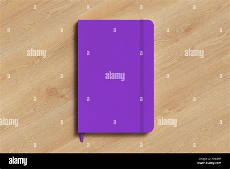 Violet Vertical Notebook With Elastic Band On Wooden Background Stock