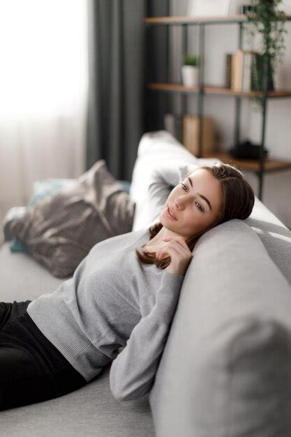 Premium Photo Woman Relaxing On Couch