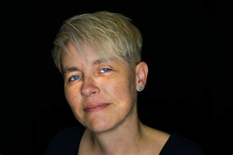 Premium Photo Portrait Of Woman Against Black Background Pixie Blond