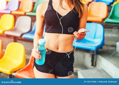 Cute Sporty Girl With Phone And Bottle Outdoor Stock Photo Image Of Music Holding