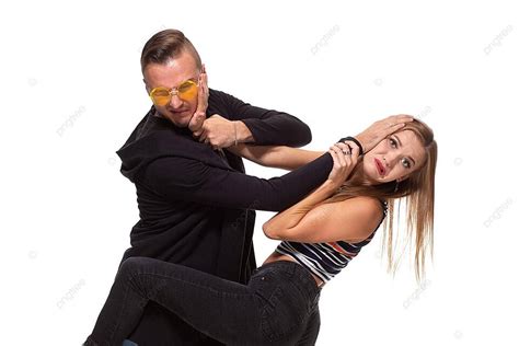 Young Couple Engaging In A Heated Argument With Poignant Expressions