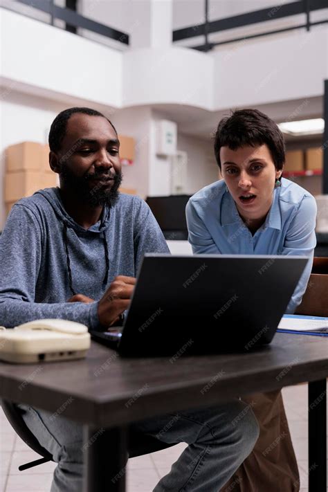 Premium Photo Senior Man Using Laptop While Sitting On Table