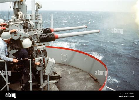 Gunners Mates Fire A Mark 33 3 Inch 50 Caliber Gun Aboard The