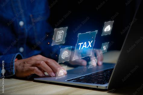 Income Tax Concept Businessman Using Laptop Analyzing Data To Online