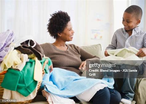 Mom And Son Laundry Photos And Premium High Res Pictures Getty Images