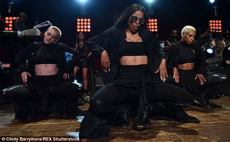 Ciara Displays Her Rippling Abs In A Deeply Plunging Crop Top As She Works Up A Sweat At Chicago