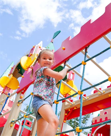 Girl Playing On Playground At Eric Hopkins Blog
