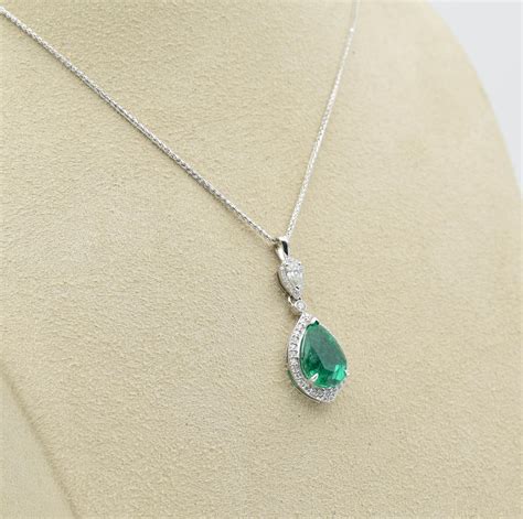 371 Carat Pear Shaped Emerald And Diamonds Pendant In 18k White Gold