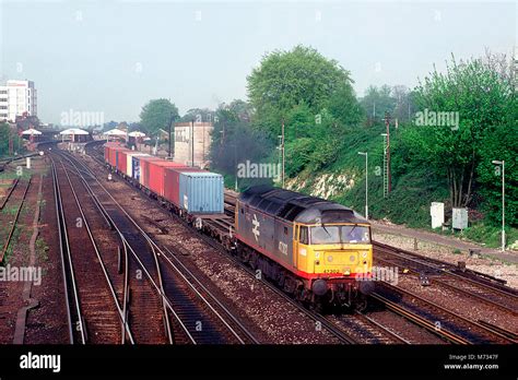 A Class 47 Diesel Locomotive Number 47302 Working A Freightliner Train