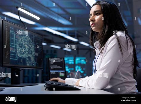 Admin Working On Pc In Data Center With Artificial Intelligence Technology To Process Massive