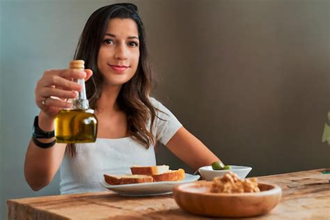 Premium Photo A Healthy Snack With Olive Oil And Bread
