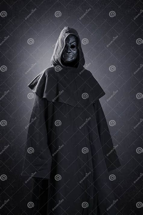 Vampire With Cape Showing His Scary Teeth Over Dark Misty Background Stock Image Image Of